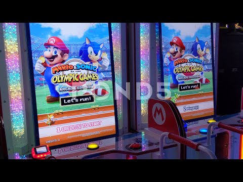 Playing mario and sonic at the Olympic Games arcade at Dave & Buster’s ...