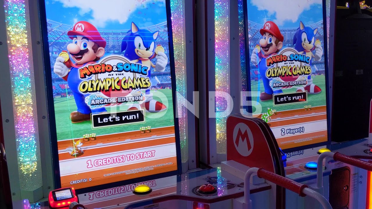 Playing mario and sonic at the Olympic Games arcade at Dave & Buster’s ...