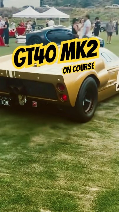 Gold Ford GT40 mk2 rolling out from an event off the golf course at ...