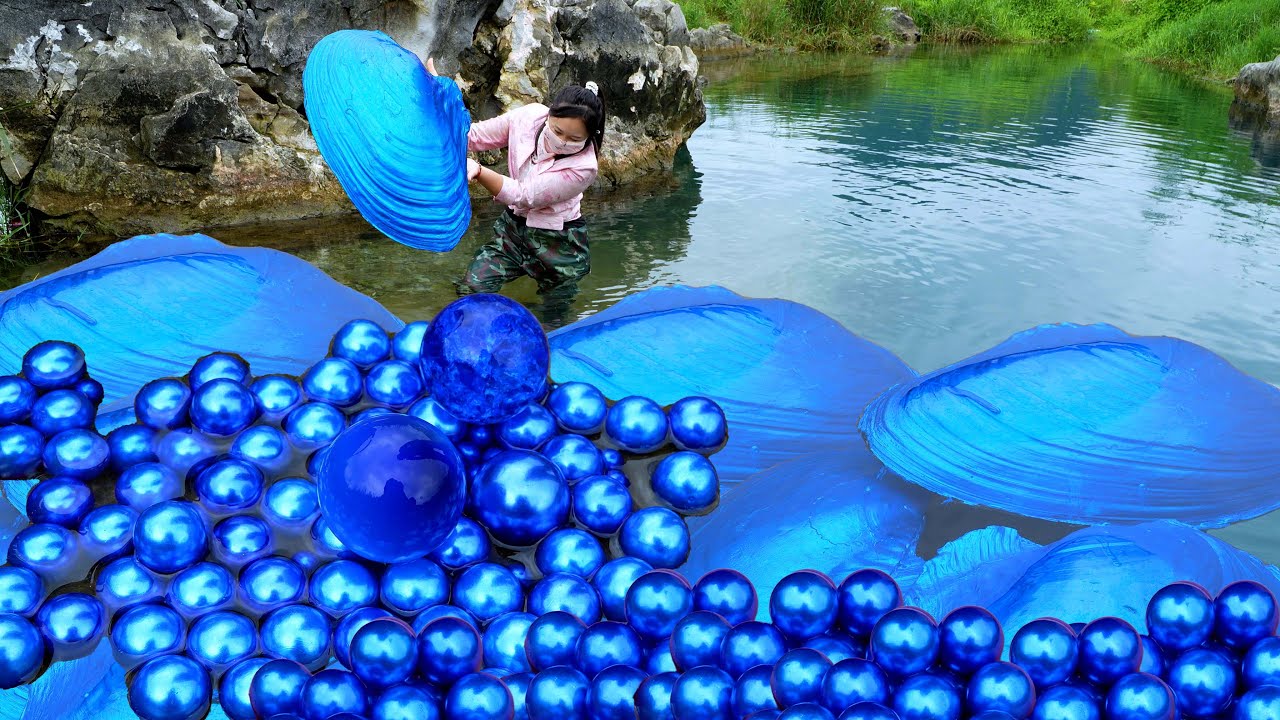 Giant blue clams grow in the deep pool, nurturing countless precious ...