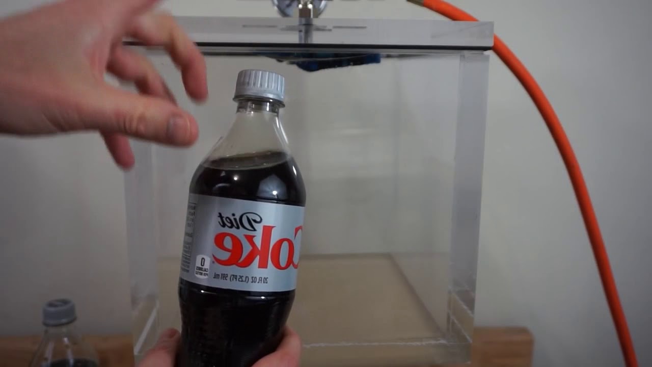 WHAT HAPPENS WHEN YOU DROP A MENTOS IN COKE IN A VACUUM CHAMBER - YouTube