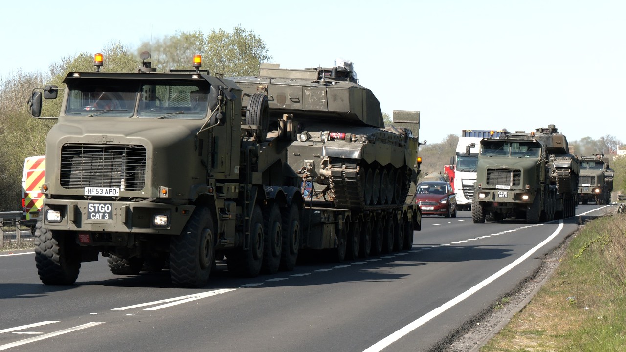 Tank transporters and large Oshkosh army trucks - YouTube