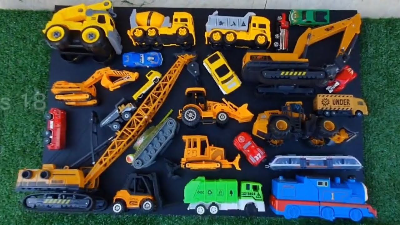 Menemukan mobil trailer, crane, kereta api, mobil balap, truk sampah ...