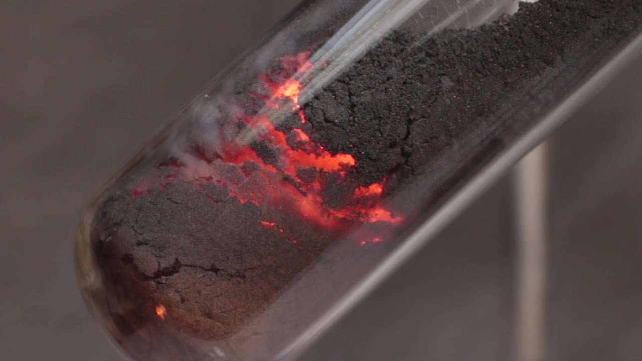 Reduction of copper (II) oxide by carbon; 2CuO + C = 2Cu + CO2 - YouTube