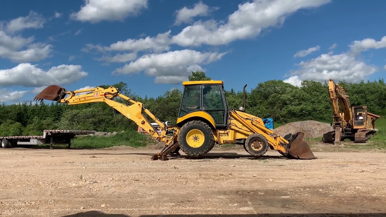 2001 New Holland LB75 4X4 Backhoe - YouTube