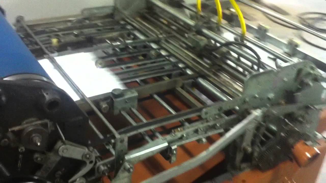 Multilith 1850 con salida de cadenas - YouTube