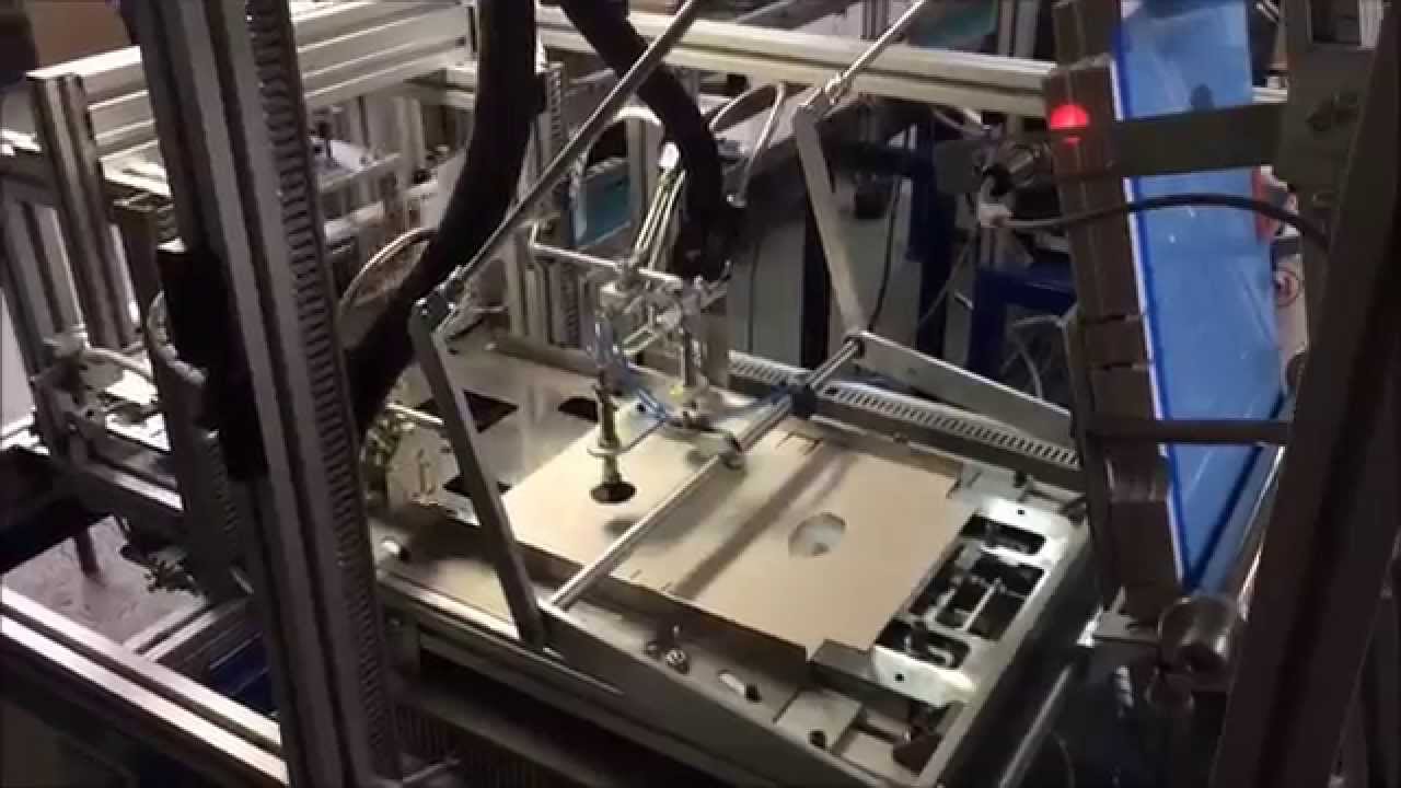 Machine for hot gluing and assembling carton box - YouTube