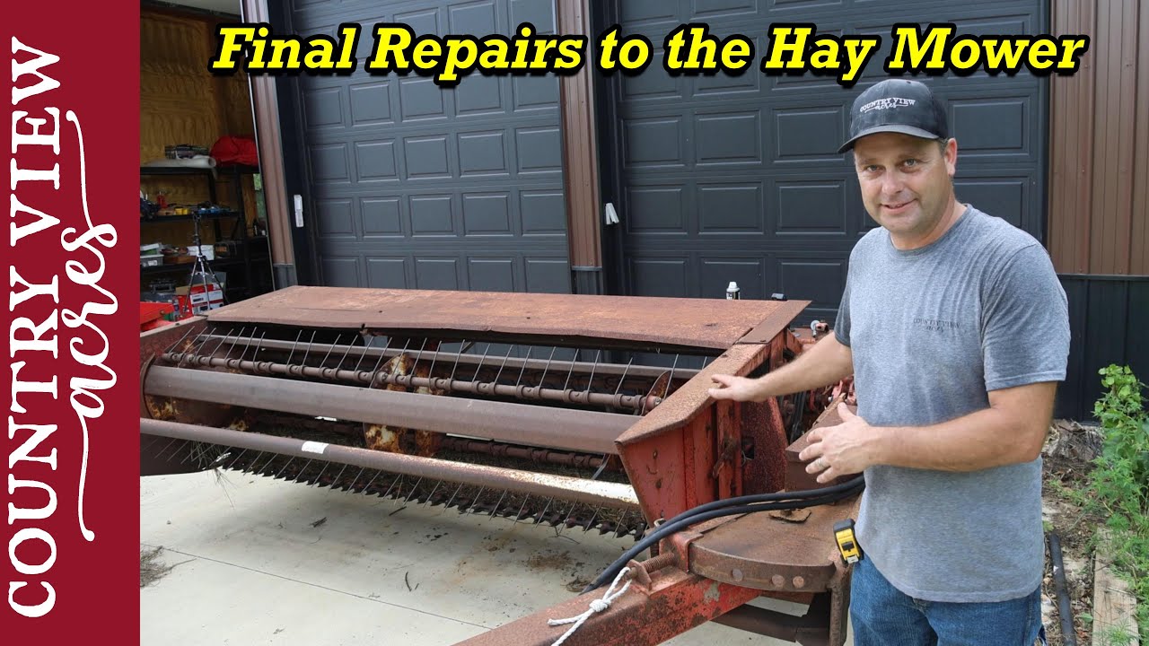Replacing broken floatation spring in the Hesston Hay Mower. It's now ...