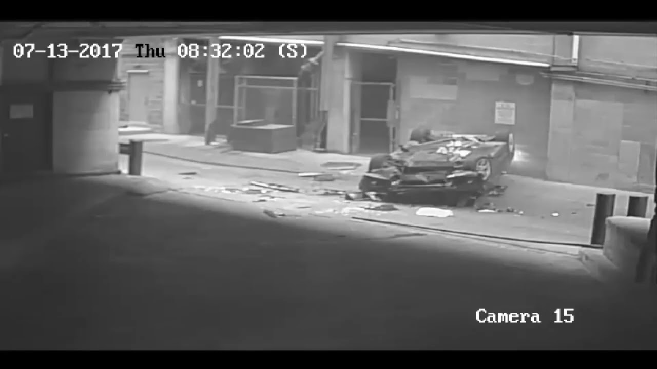 Car falls off Austin building - YouTube
