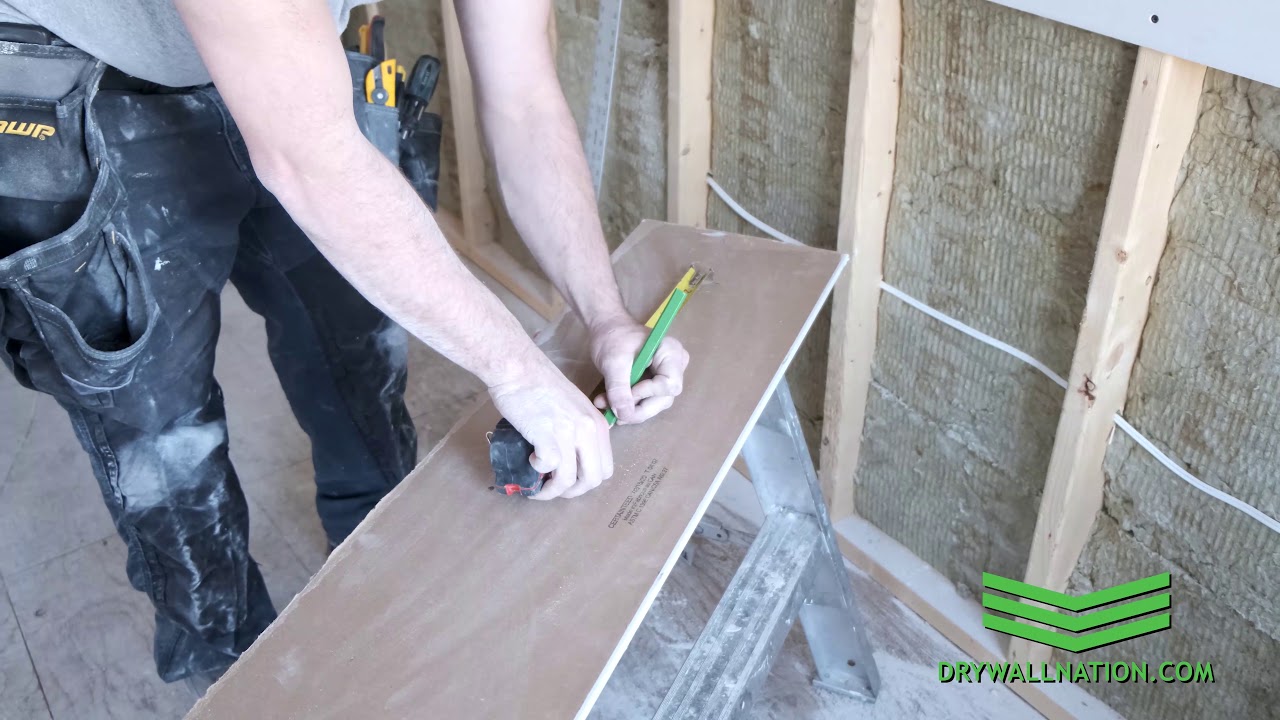 Back cutting drywall to wrap around bookshelf - YouTube