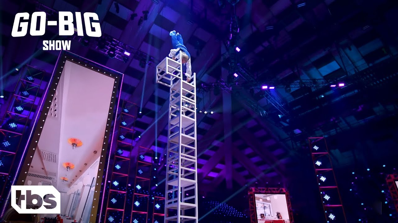 Go Big Show: 63 Year Old Acrobat The Sladek Balances on Stacked Chairs ...