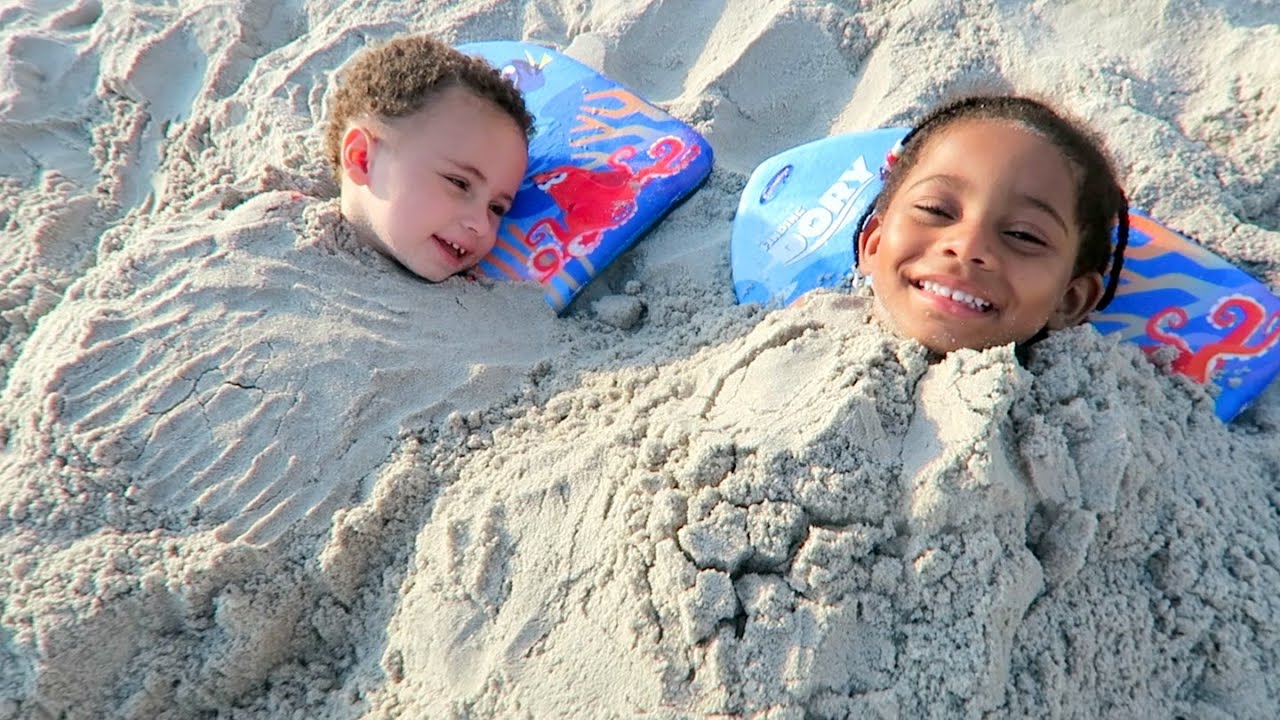 Babies Buried in the Sand! - YouTube