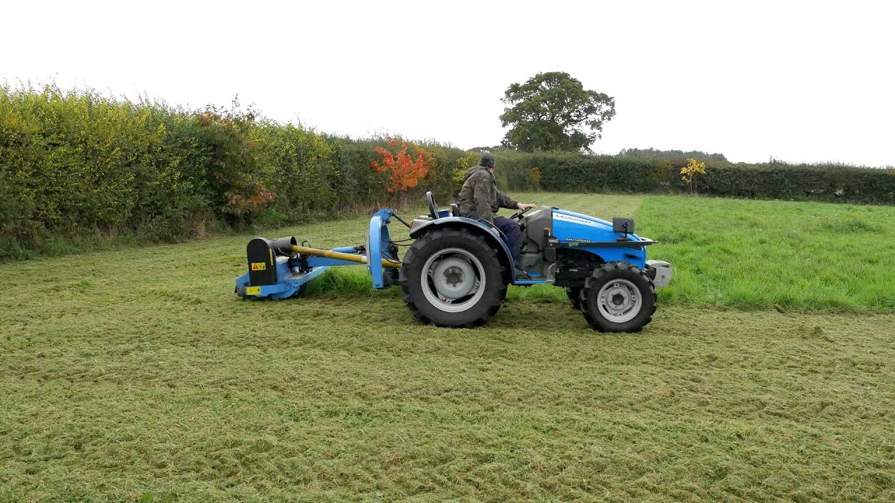 mowing the field out back - YouTube