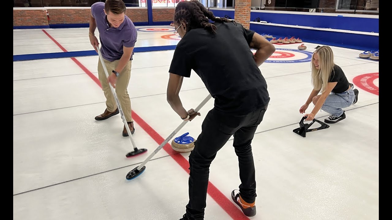 The Hub Stadium in Novi opens with curling lanes, football bowling, axe ...
