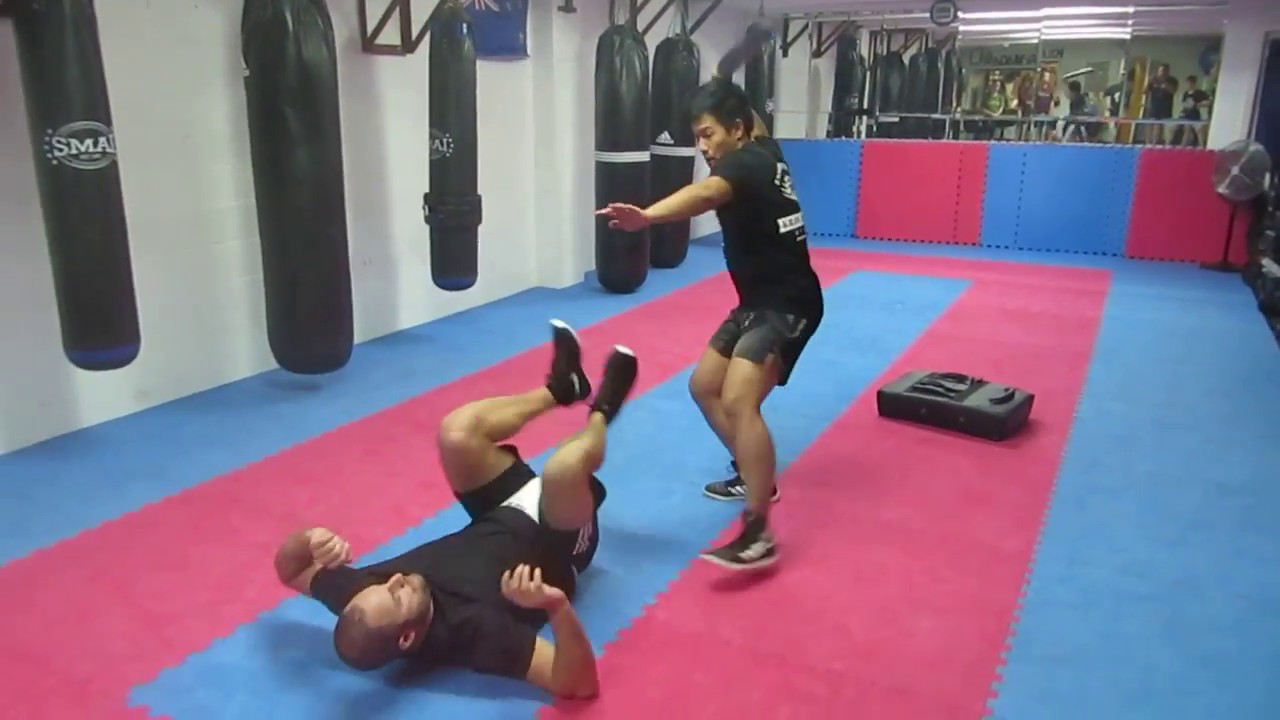 Krav Maga Auckland - Baton attack defence from the ground @ Krav ...