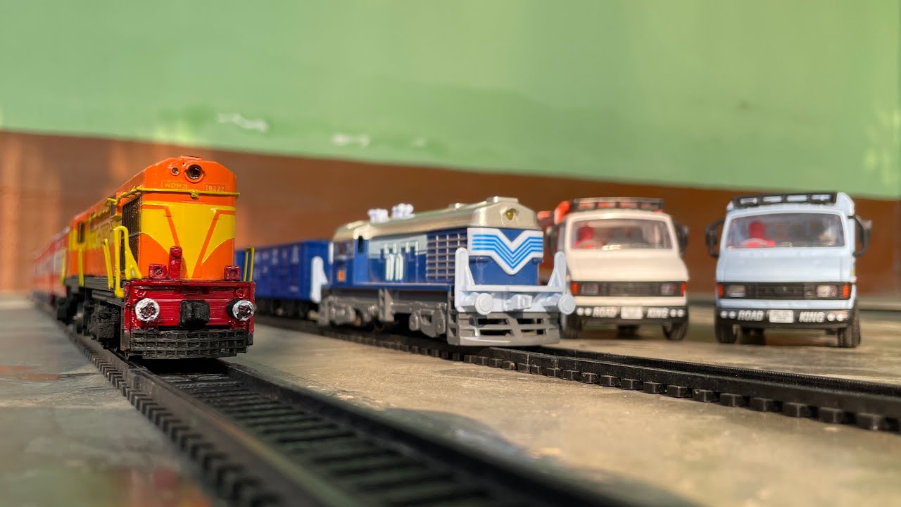 WDM2 Indian Locomotive with Freight Train and Tata 407 Truck - YouTube
