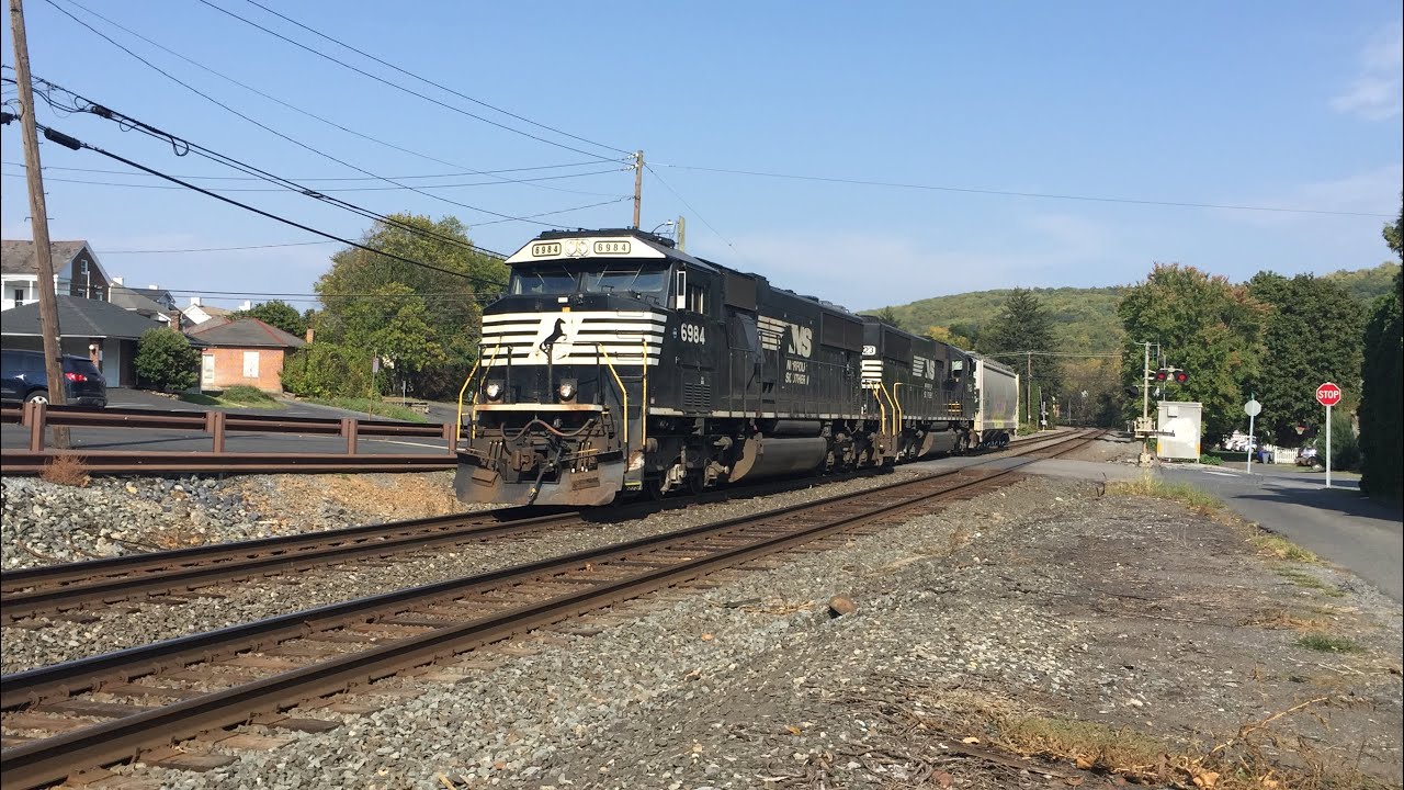 NS H65 on the Reading Line with NS 6984 leading and NS 7023 trailing and one covered hopper ...