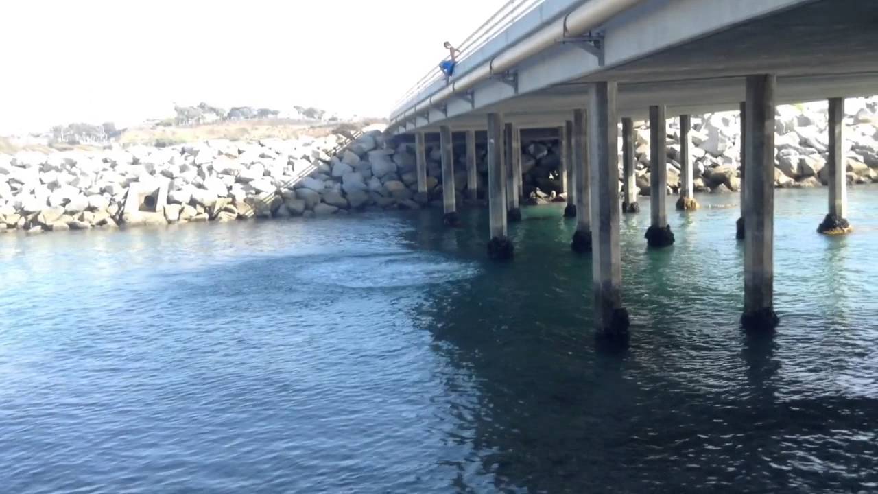 My uncle and my little brother jumping off ponto bridge in Carlsbad ...
