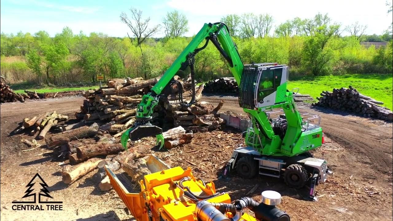 Sennebogen Loading our mulch grinder - YouTube