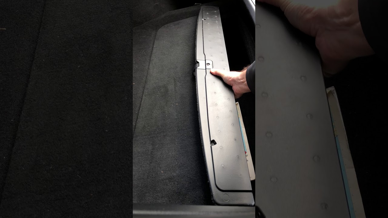 Tesla rear trunk cover storage - YouTube