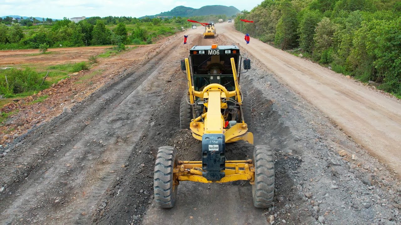Moto Grader And Roller Contruction Raod Near The Beach - YouTube