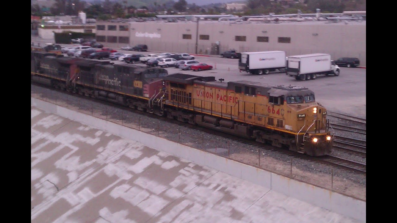 3 UP/SP AC4400's Lead a Stack/Baretable Train by the 1st Street Bridge ...