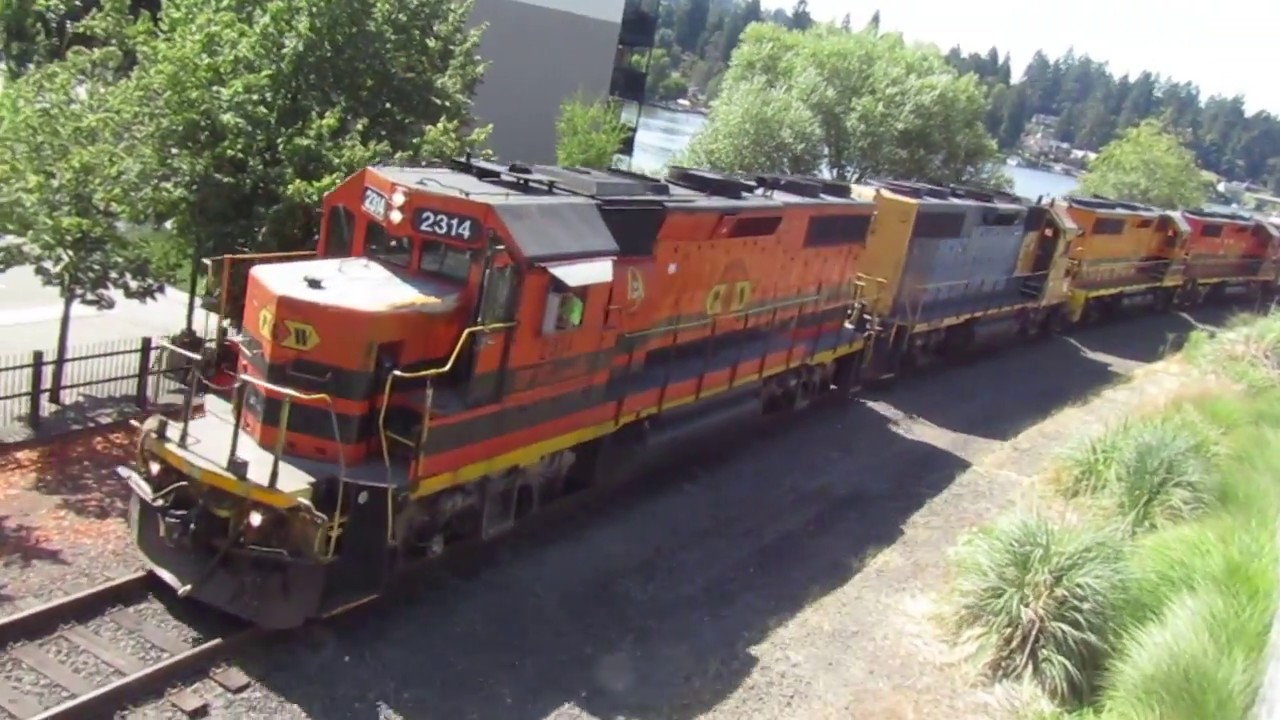 Portland & Western Railroad's 663 passes Millennium Plaza Park in Lake ...