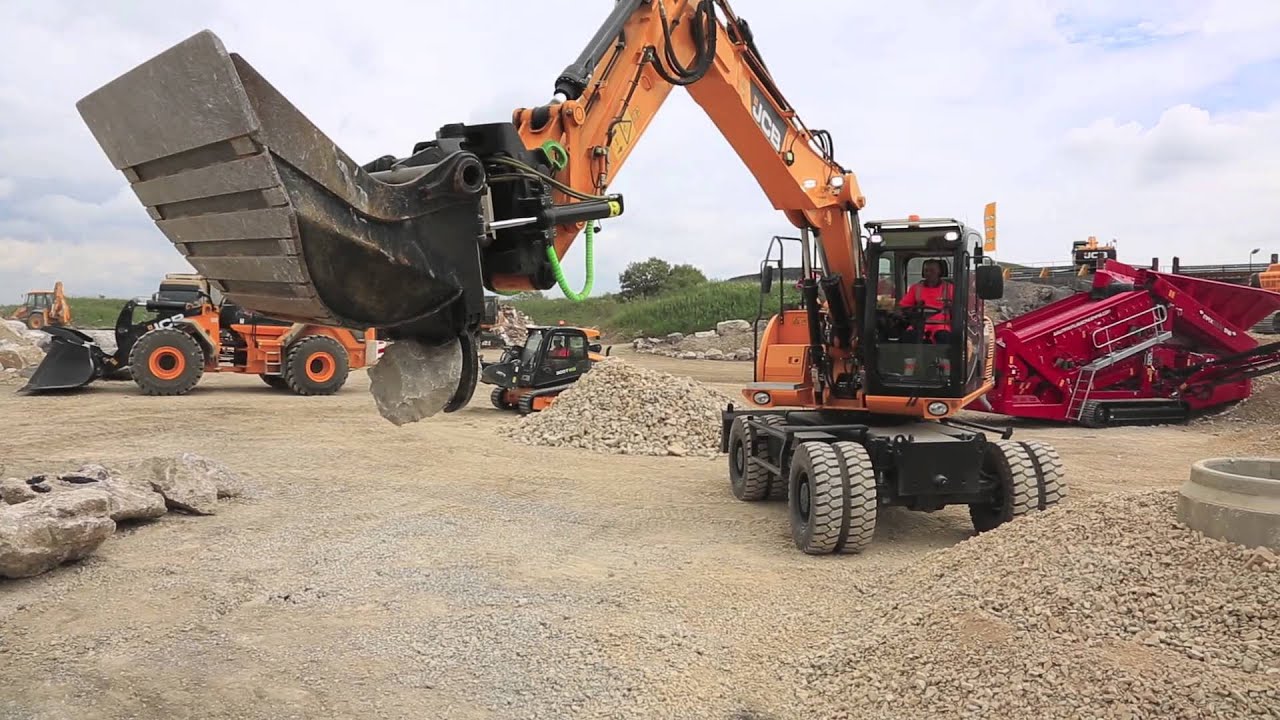 hillhead JCB js145w steel wrist X18 tilt rotator - YouTube