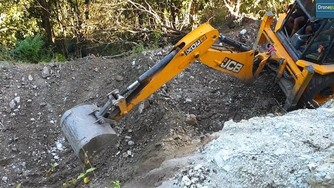 Fixing Landslide Damaged Hilly Road With JCB Backhoe - YouTube