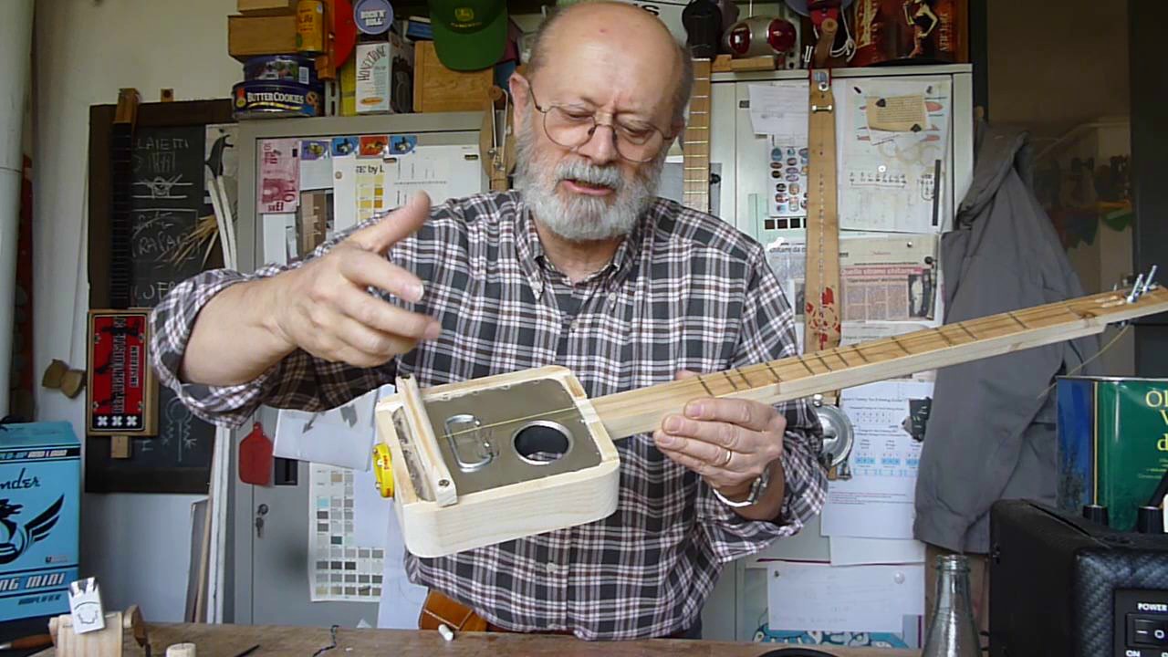cbg - oil can guitar two string drawer slide guitar - random strumming ...