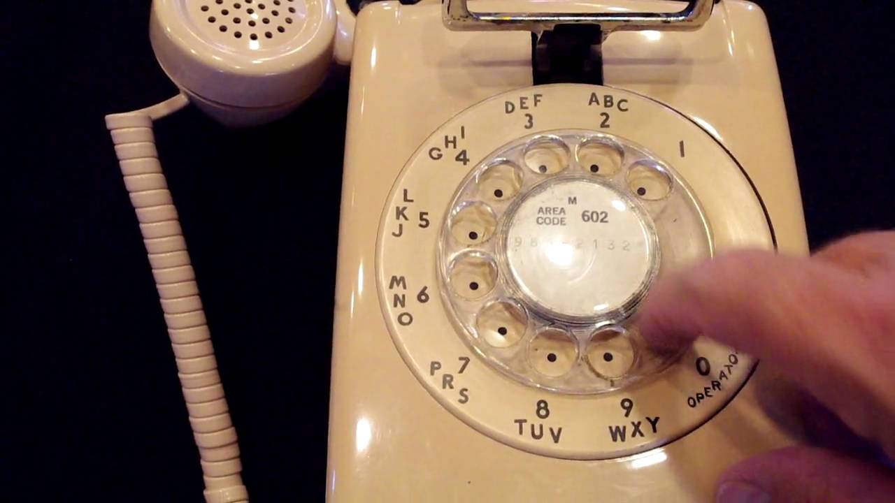 wall phone dialing - YouTube