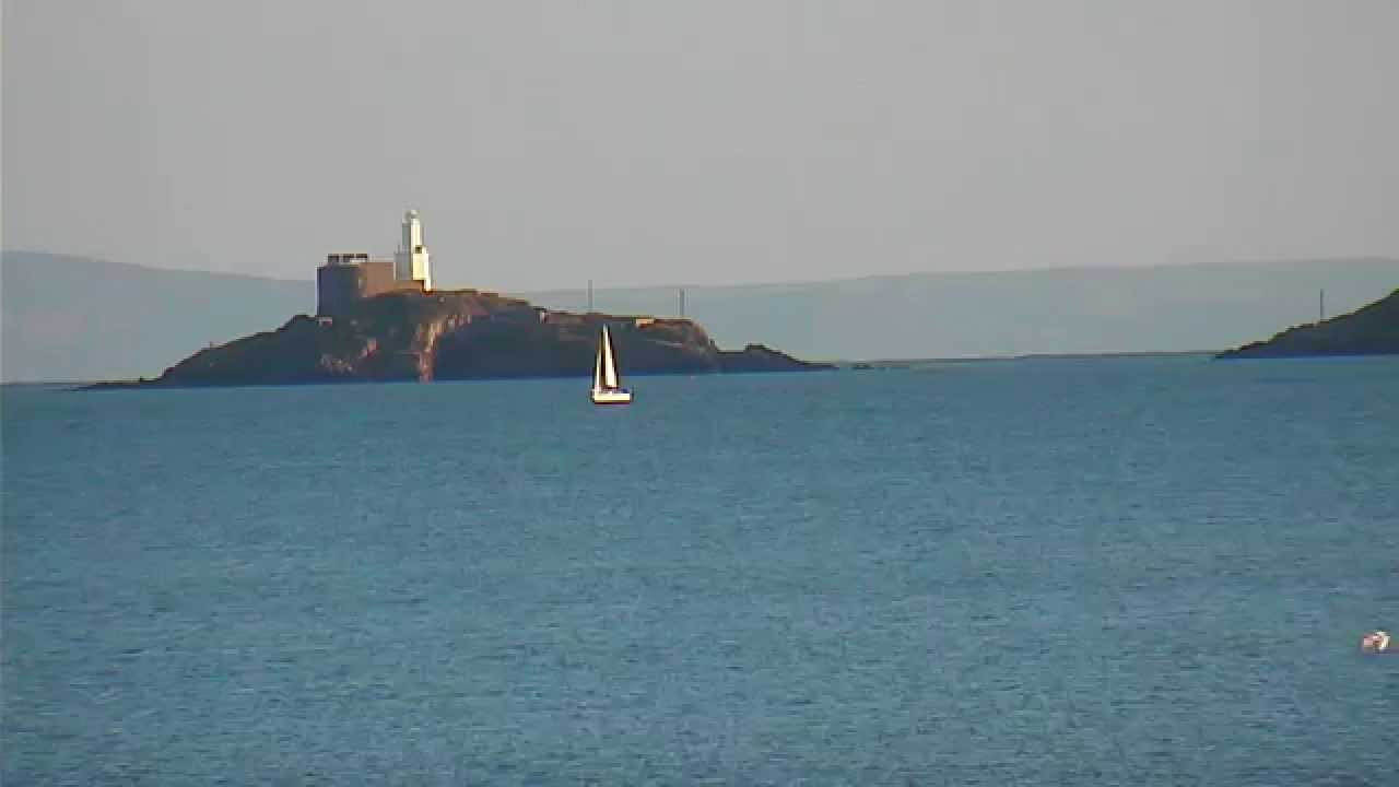 Sun setting over Mumbles and Swansea Bay - GowerLive - YouTube