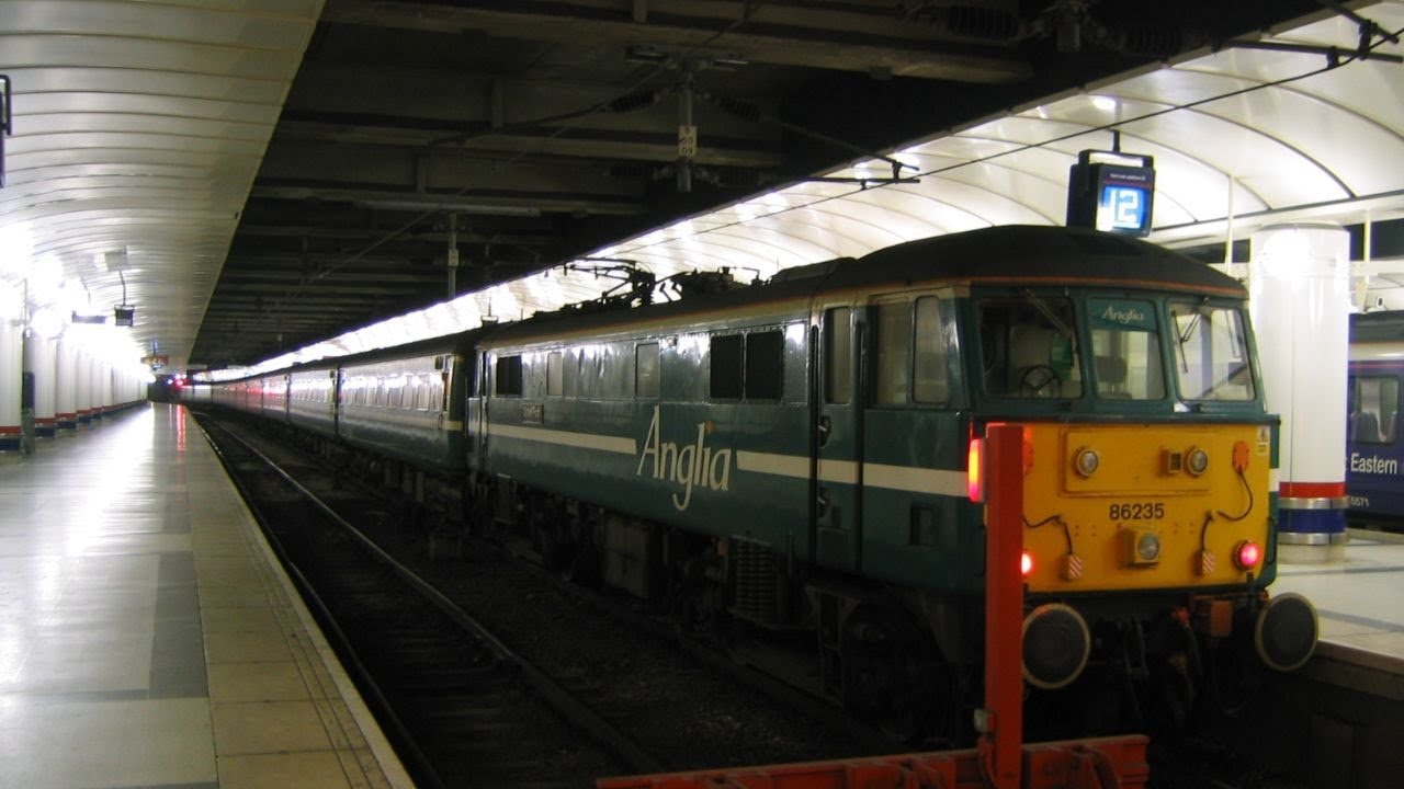 UK: Anglia Class 86 electric loco passes Stratford on a Liverpool St to ...
