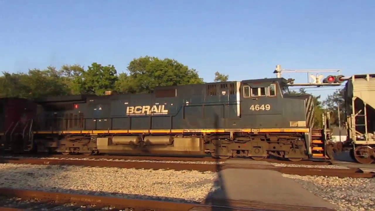 CN 2437 Cowl Unit and BCRail BCOL 4649 Pull CN Grain Train - YouTube