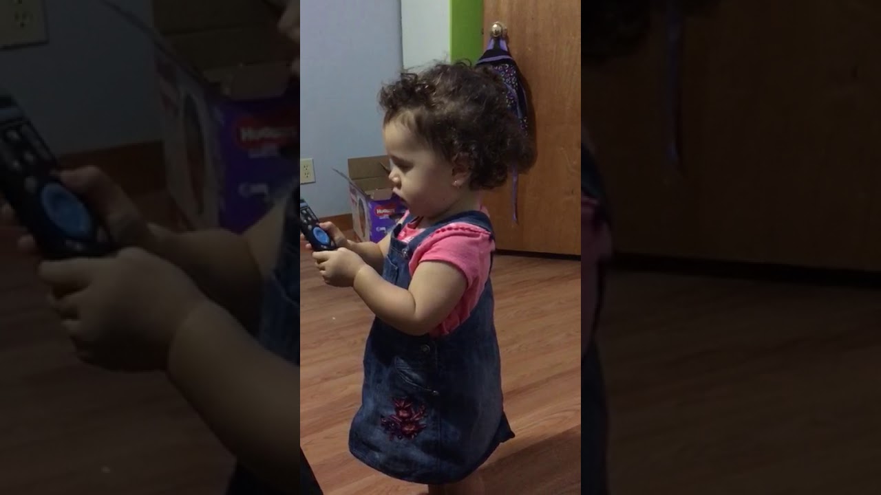 Emma making calls on the remote. - YouTube