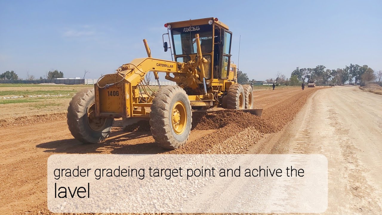 moter grader operater laveling aggregate base course gradeing the ...