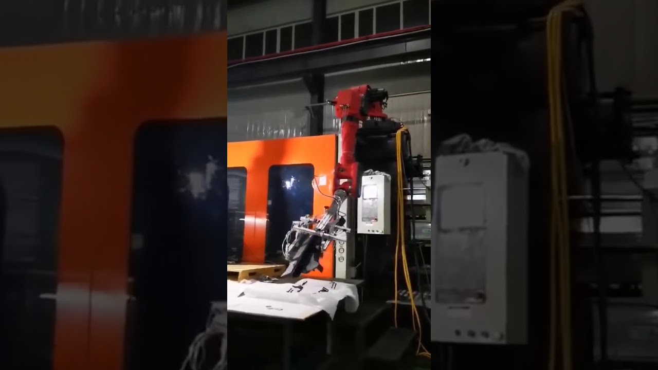 Robot for injection molding machine - YouTube
