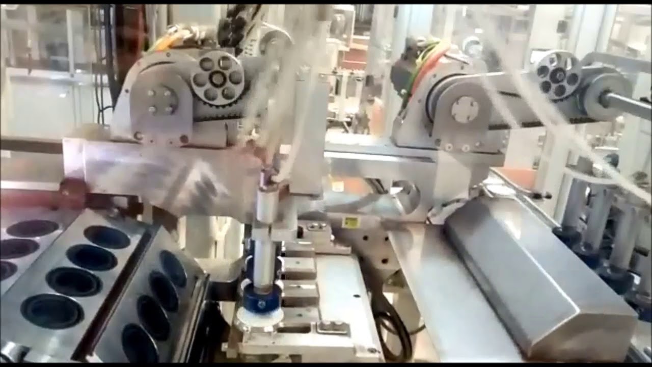 Coffee pods handling on manufacturing machine by Vuototecnica Bernoulli ...