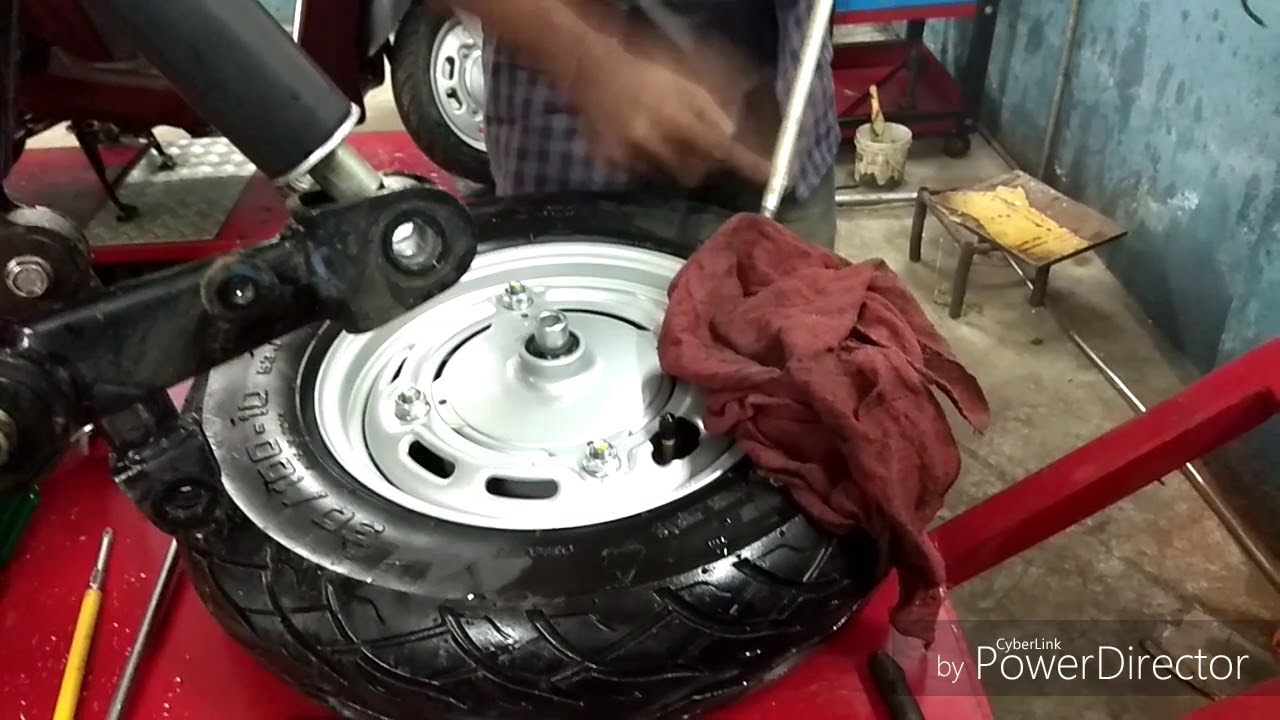 How to grease Scooty front wheel bearing HD - YouTube