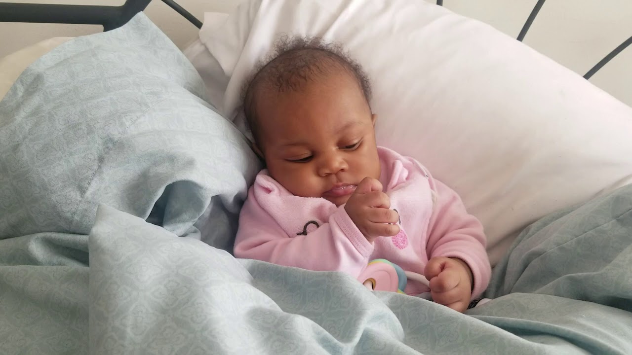 Baby Celine at three months, starting to sit up and have some playing ...