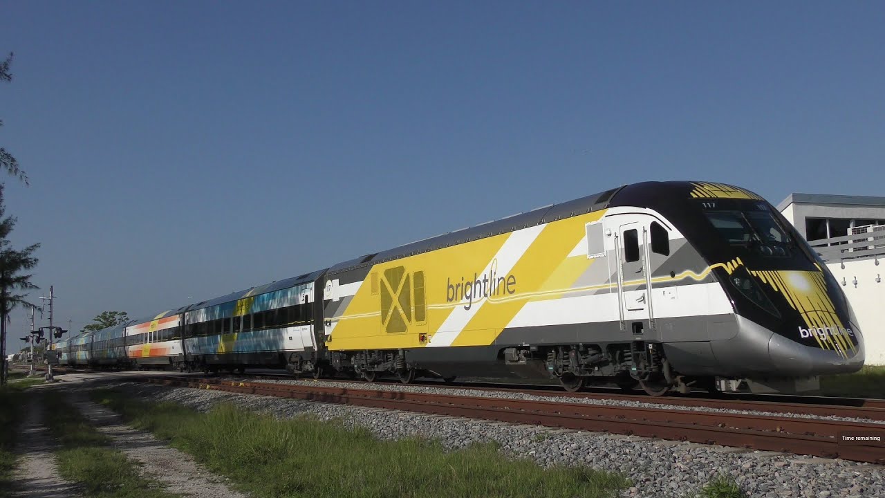 A mixer and a freight - FEC 101-09 and Brightline BLF701 northbound ...