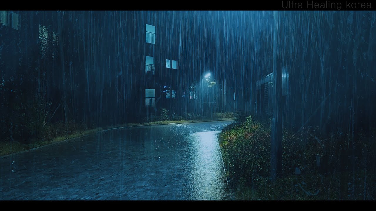 Fall into a deep sleep listening to rain sounds under the soft street ...