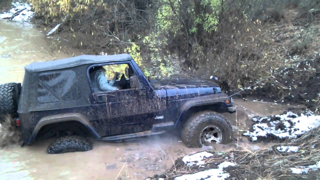 Jeep gets stuck in mud hole (part 2) - YouTube