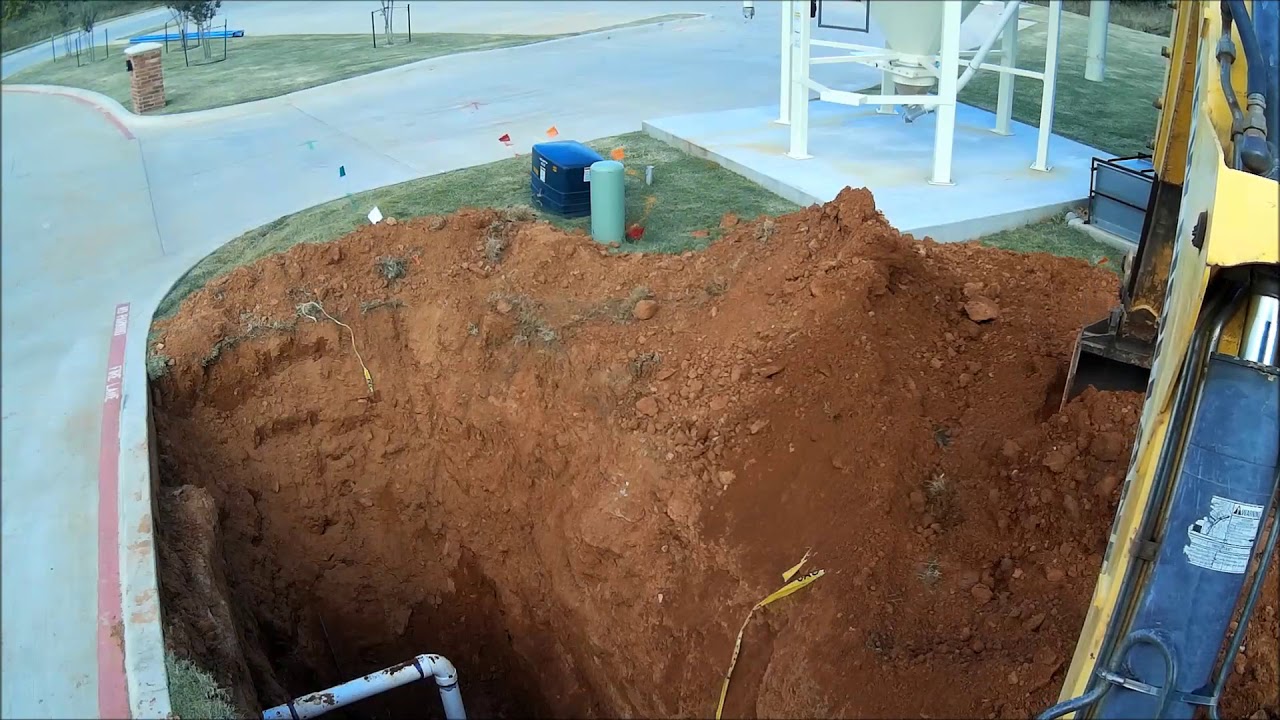 Backfilling sewer - YouTube