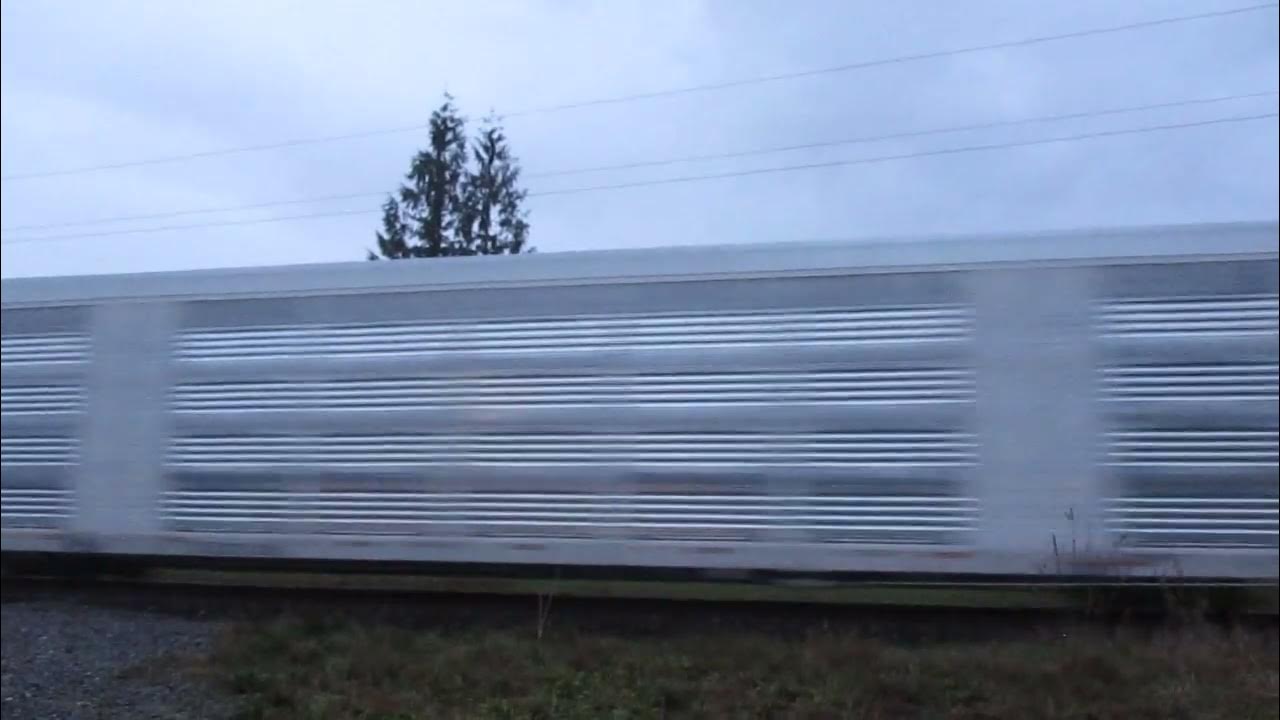 BNSF EB intermodal in Sultan WA with a BNSF H2 SD70MAC and a BNSF fakebonnet Dash 9 on the back ...