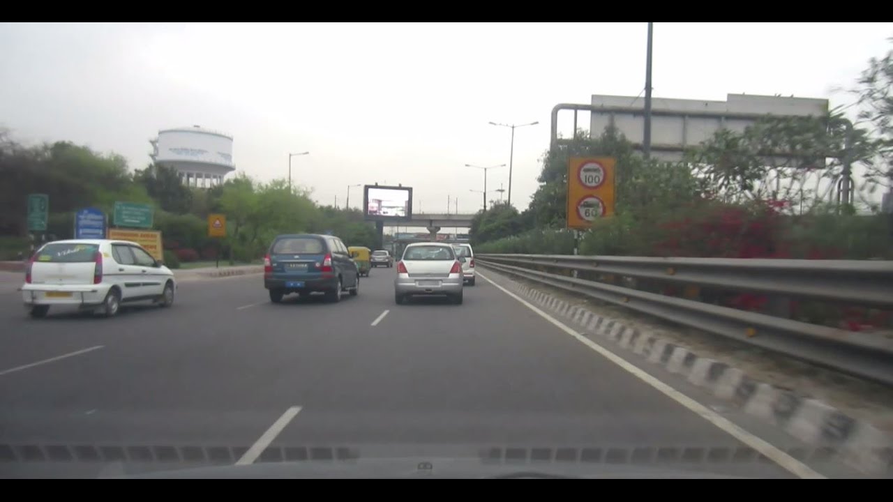 Driving through Noida–Greater Noida Expressway and service road on a ...