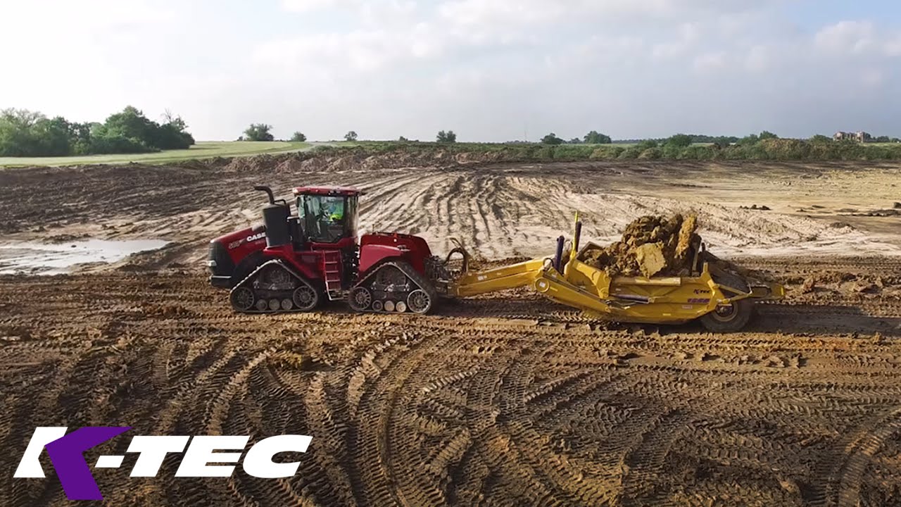 28 Cu. Yd. Scrapers Self-Loading in East Texas - YouTube