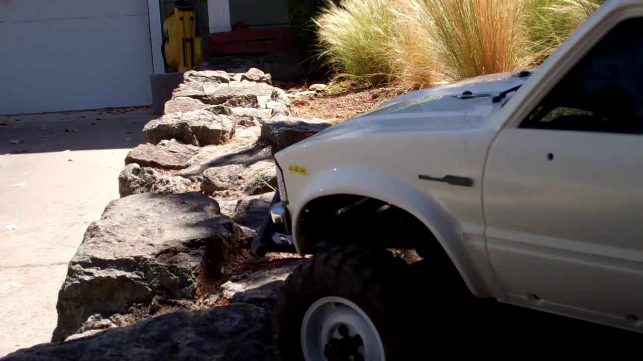 Axial Honcho w/ tamiya toyota body - YouTube