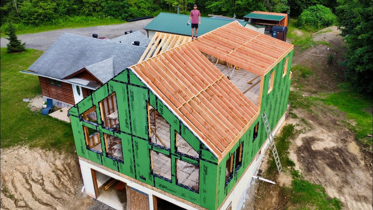 Setting Ridge Beams and Framing The Roof - House Build #13 - YouTube