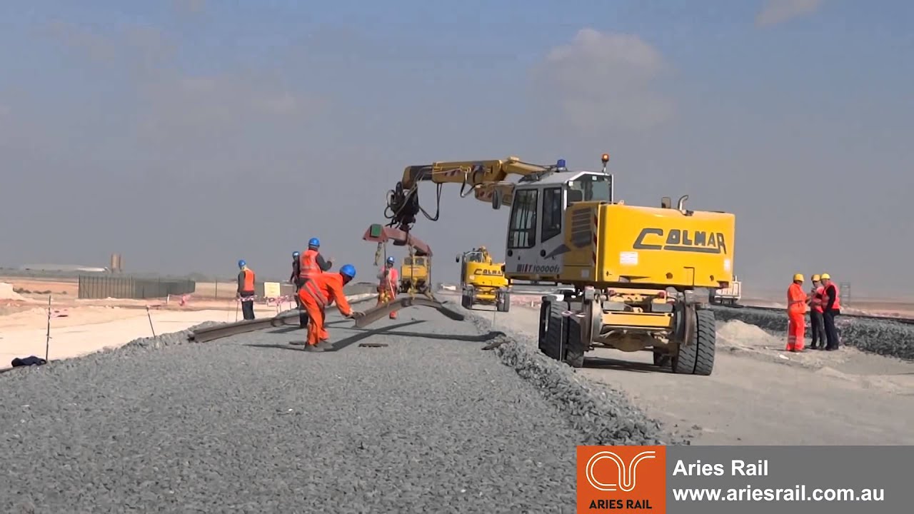 Colmar T10000FS road-rail excavator from Aries Rail - YouTube